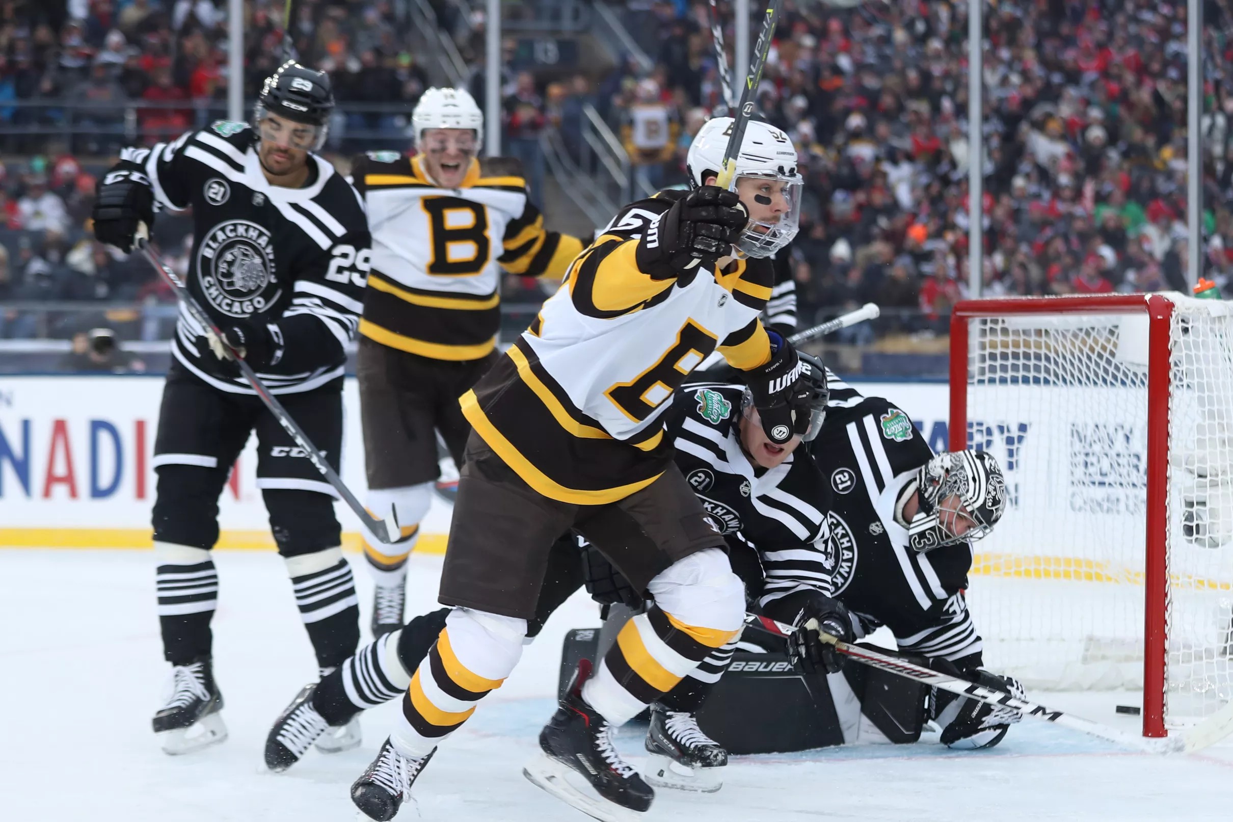 Blackhawks Fall 4 2 To Bruins Remain Winless In Winter Classic Games blackhawks-fall-4-2-to-bruins-remain-winless-in-winter-classic-games