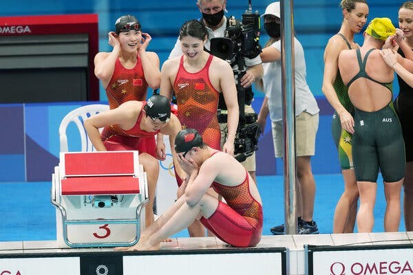 China shocks Australia in the women’s 4x200 free relay, setting a world record.
