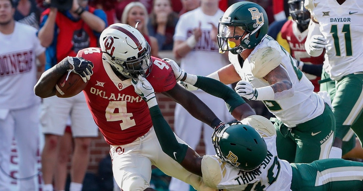 Murray throws for 6 TDs as No. 6 Oklahoma routs Baylor 66-33