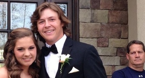 Gene Chizik gives the ultimate disapproving dad face to his daughter's ...