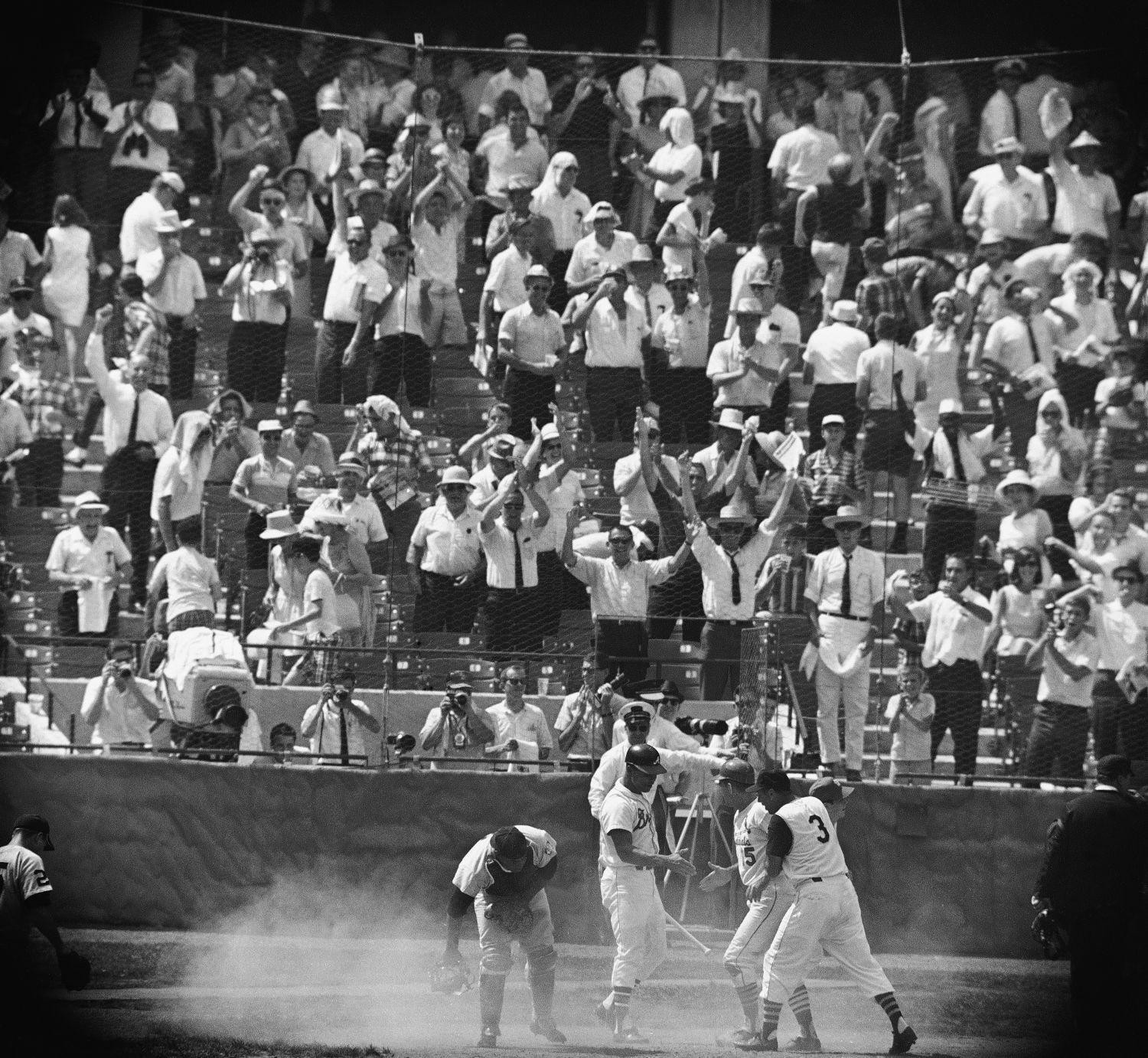 July 12, 1966: With temperatures hitting 103 at the All-Star Game, a ...