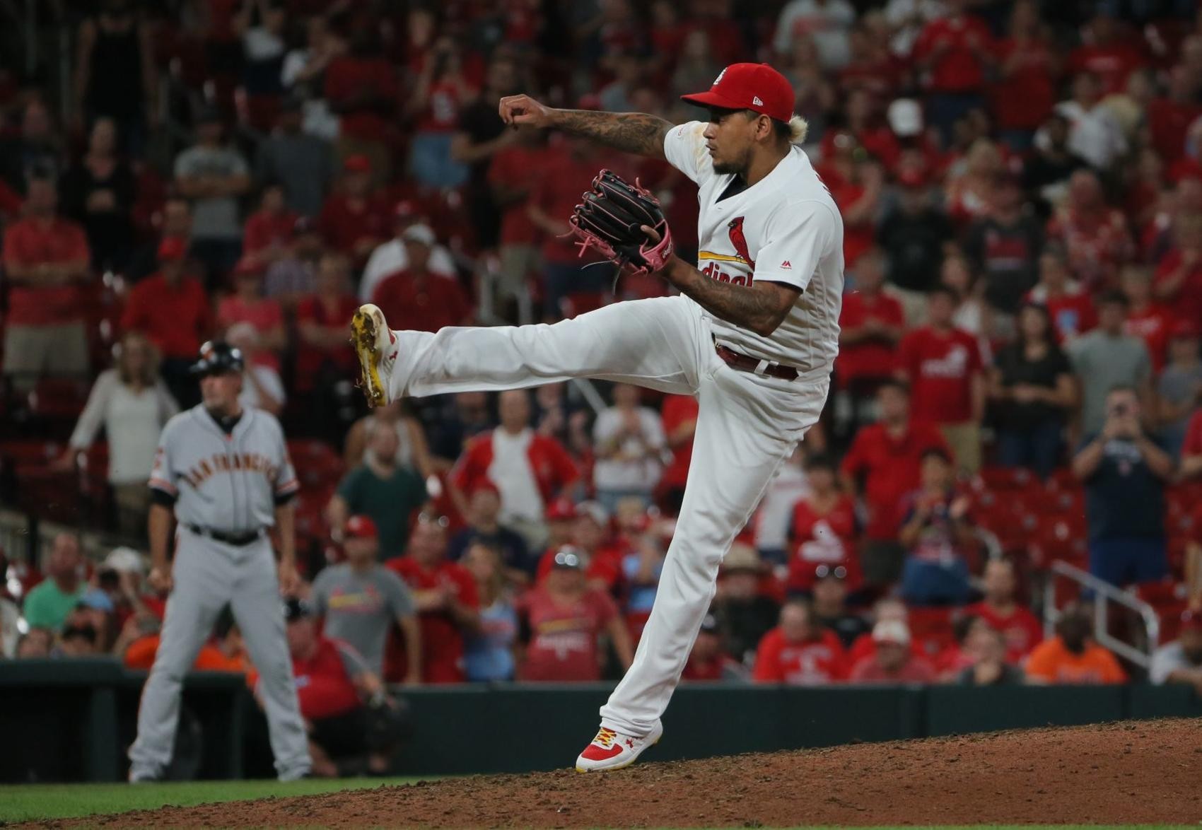 Martinez returns to Cardinals and is cleared to pitch