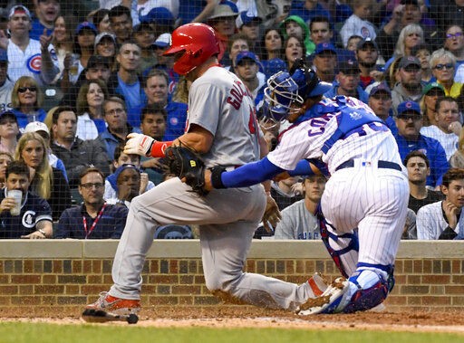 Wainwright exits with injury as Cardinals get swept again at Wrigley
