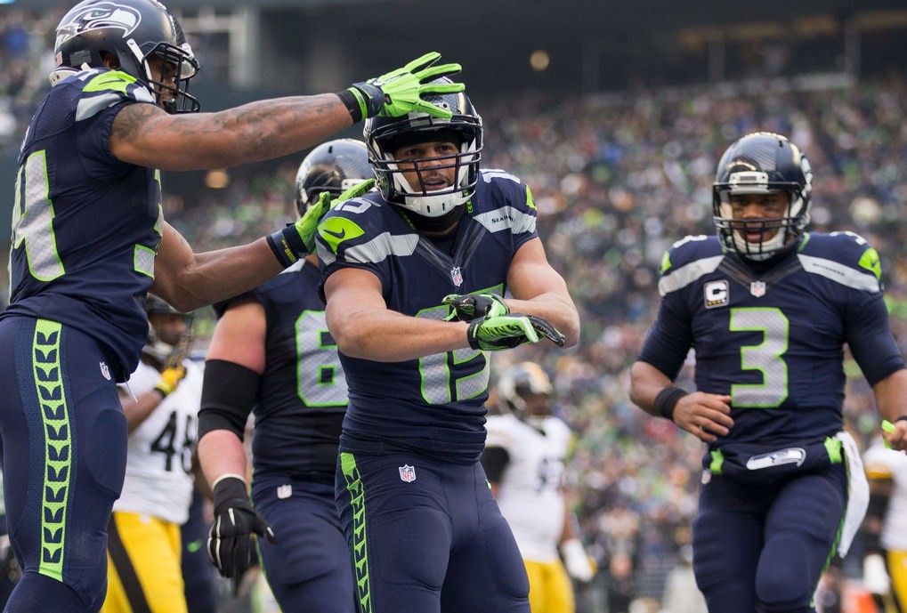 So what’s with that pointing-at-their-wrist thing the Seahawks ...