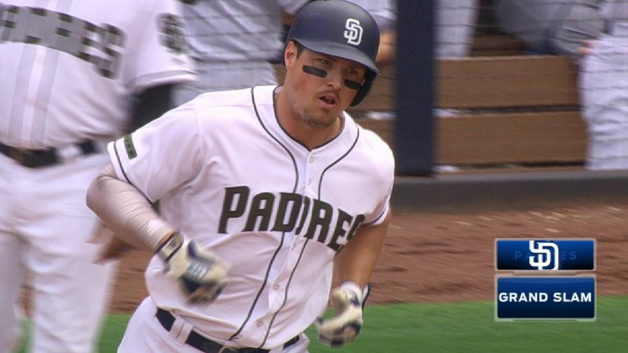 Grand opener: Padres slam reigning champs