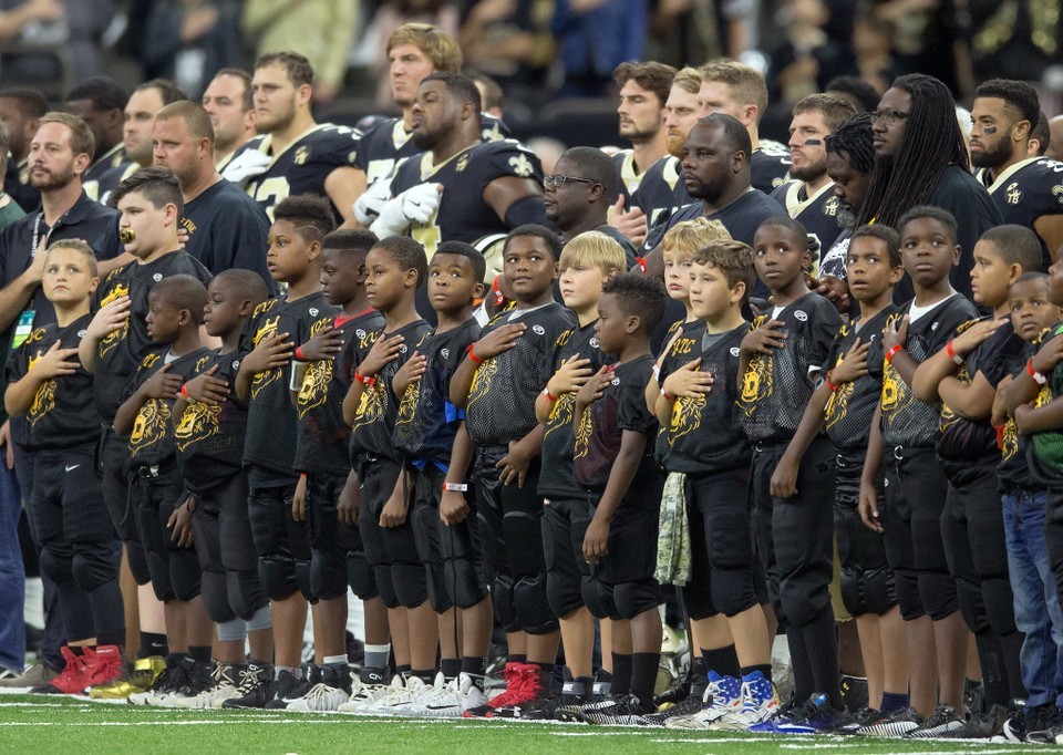 NFL, players union reps meet to discuss national anthem policy