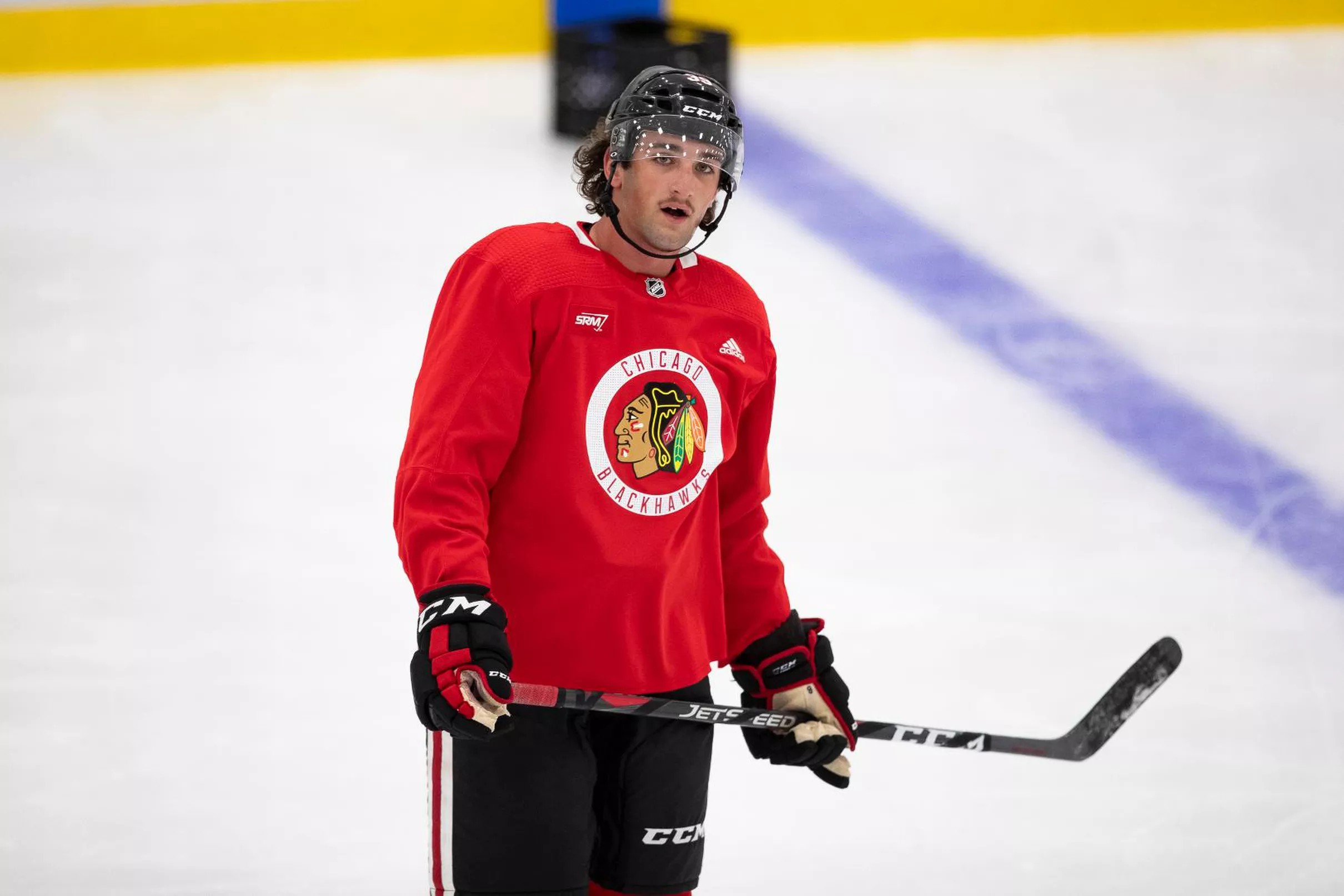 Blackhawks prospect Dennis Gilbert missed training camp due to upper ...