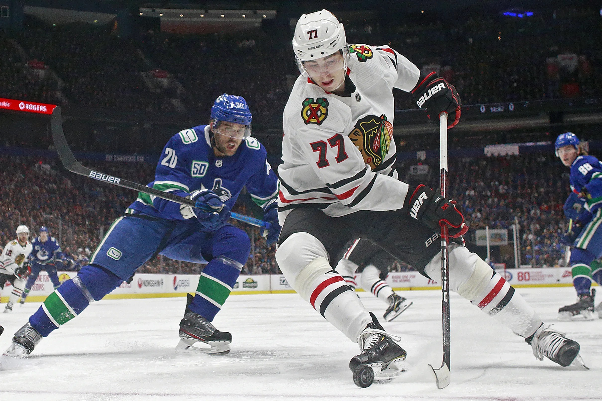 Blackhawks recall Ian McCoshen, reassign Matthew Highmore to AHL