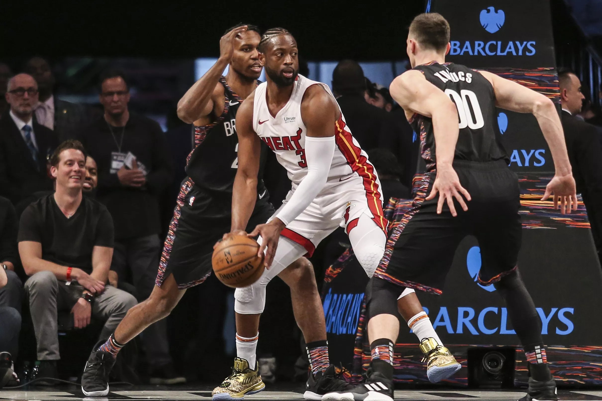 Nets spoil Wade’s finale and enter playoffs with a three-game win ...