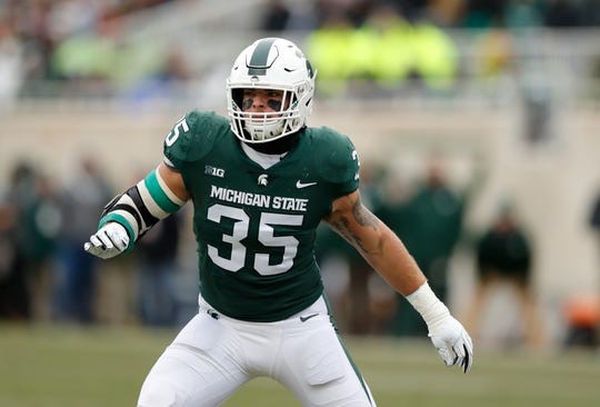 Michigan's Ben Bredeson, MSU's Joe Bachie on AP preseason All-America ...