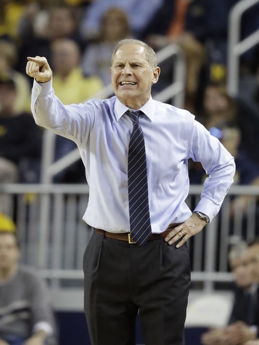 D.J. Wilson scores 28 but Michigan falls to Iowa in OT