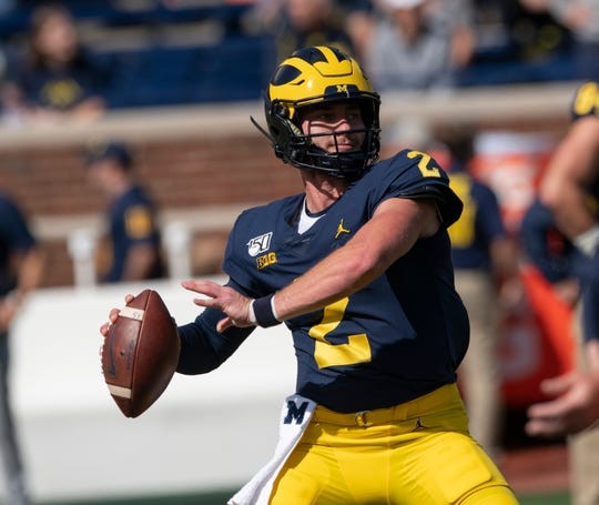 Live updates: Michigan's Patterson fumbles for second time in 1Q
