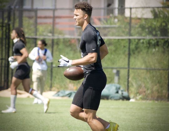 Michigan lands 4-star receiving recruit Roman Wilson from Hawaii