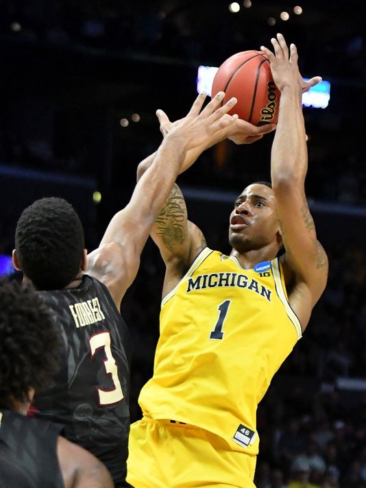 Michigan's Charles Matthews aims for downtown improvements