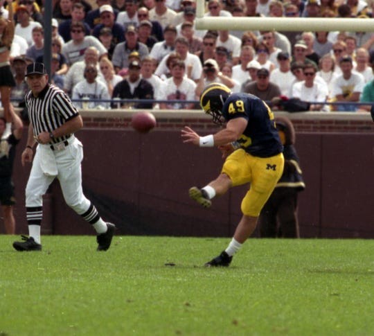 Former Michigan kicker Jay Feely offers those struggling a leg stand on ...