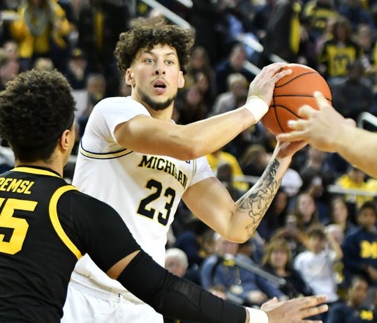 Michigan's Isaiah Livers has to go through a practice before he returns ...