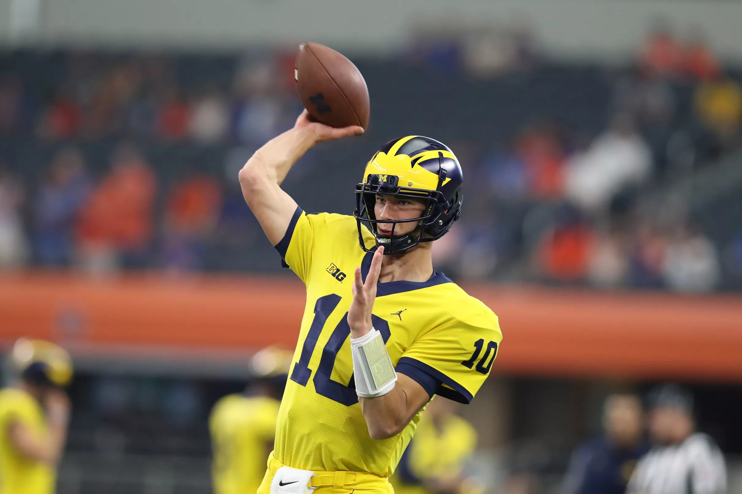 Michigan quarterback Dylan McCaffrey, brothers help save man’s life