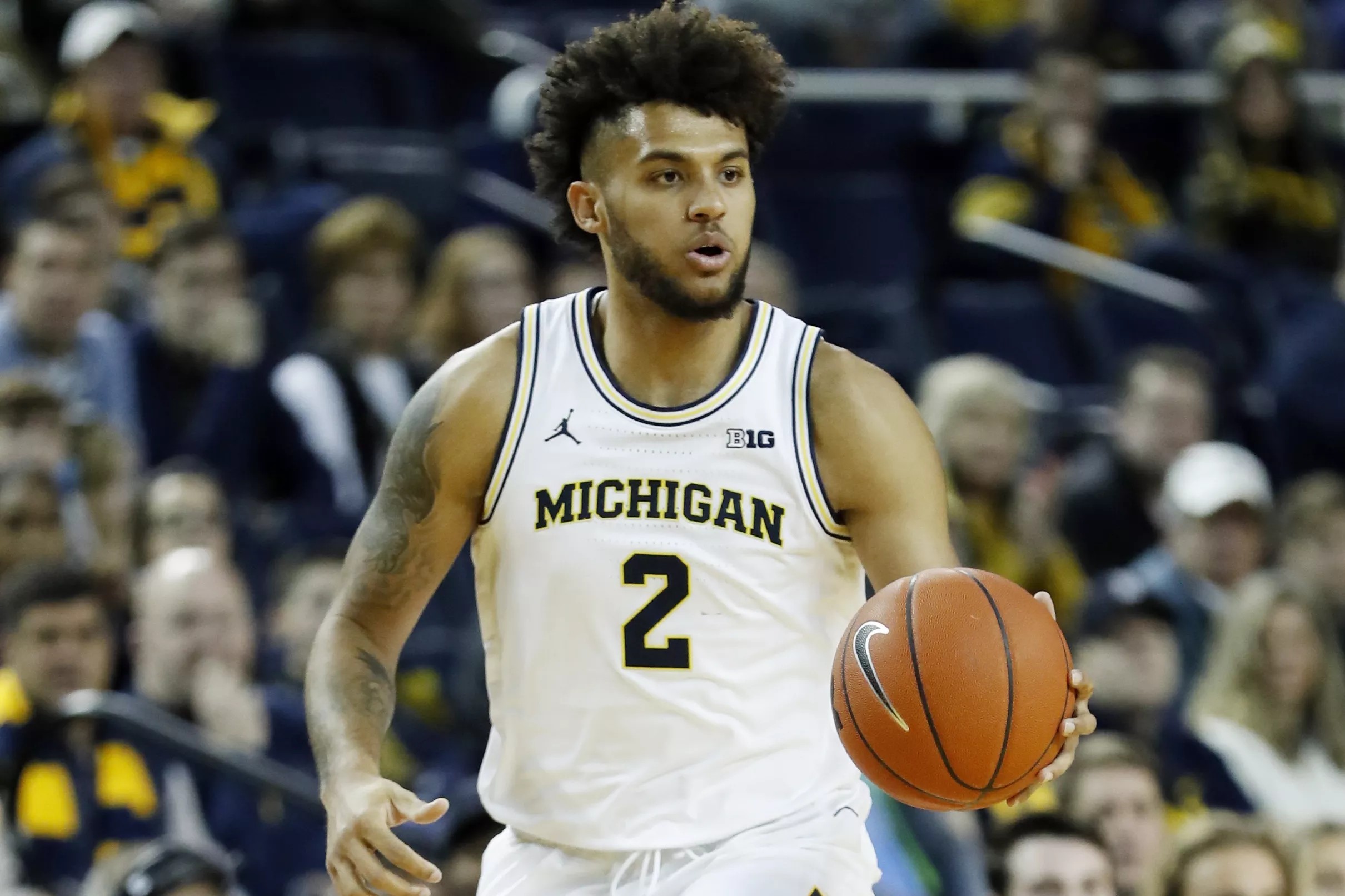 Isaiah Livers injured in game vs. Presbyterian College