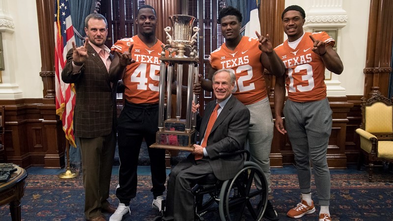 Football presents Governor’s Cup to Governor Greg Abbott