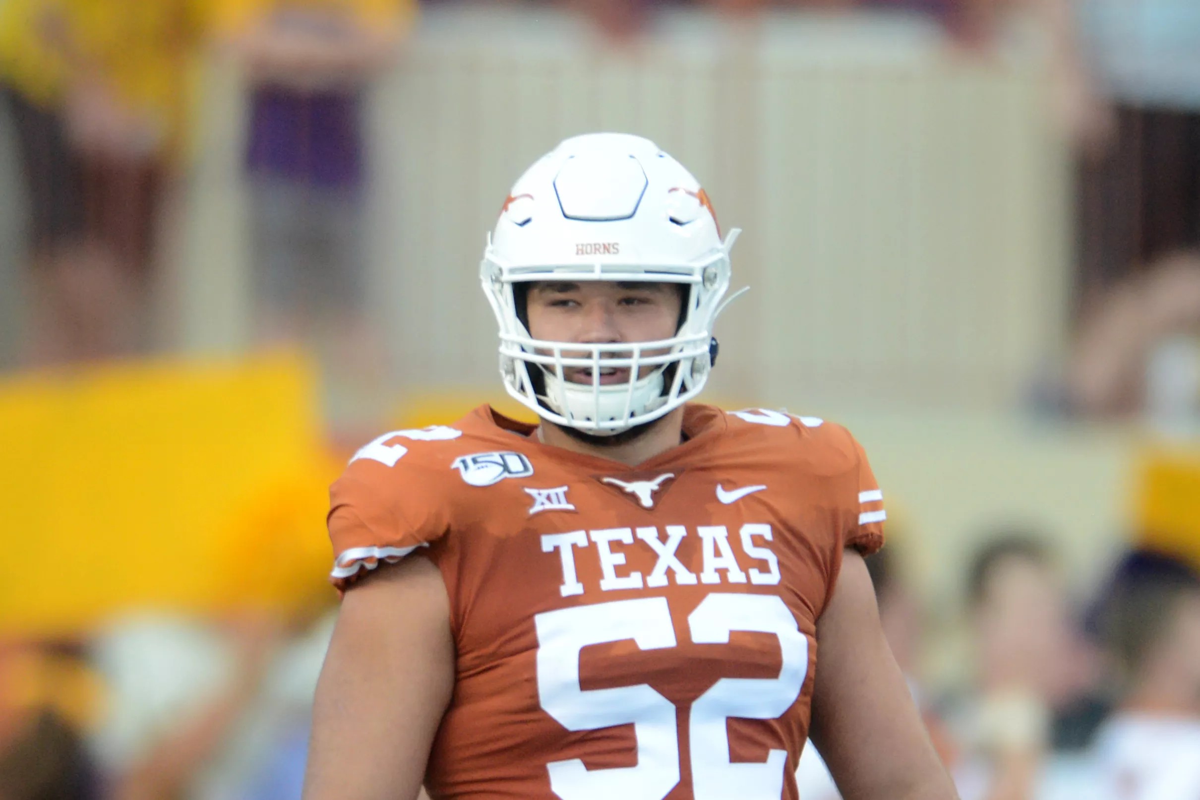 WATCH: Texas OT Sam Cosmi scores on catch and run to KO West Virginia