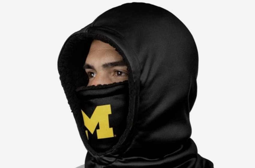Stay warm, look cool with this Michigan Wolverines hooded face cover