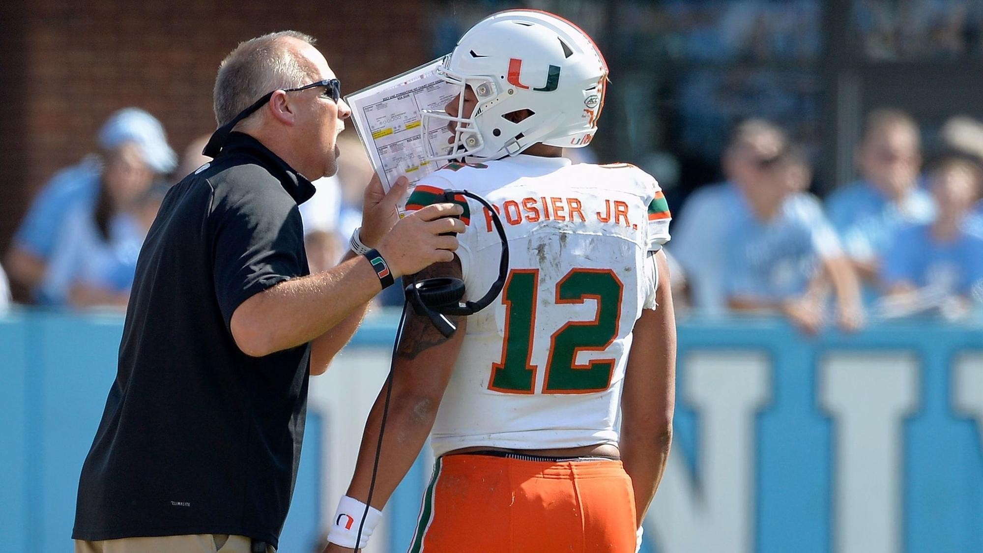 Assistant coach Jon Richt jumps in to help Hurricanes scout team during ...