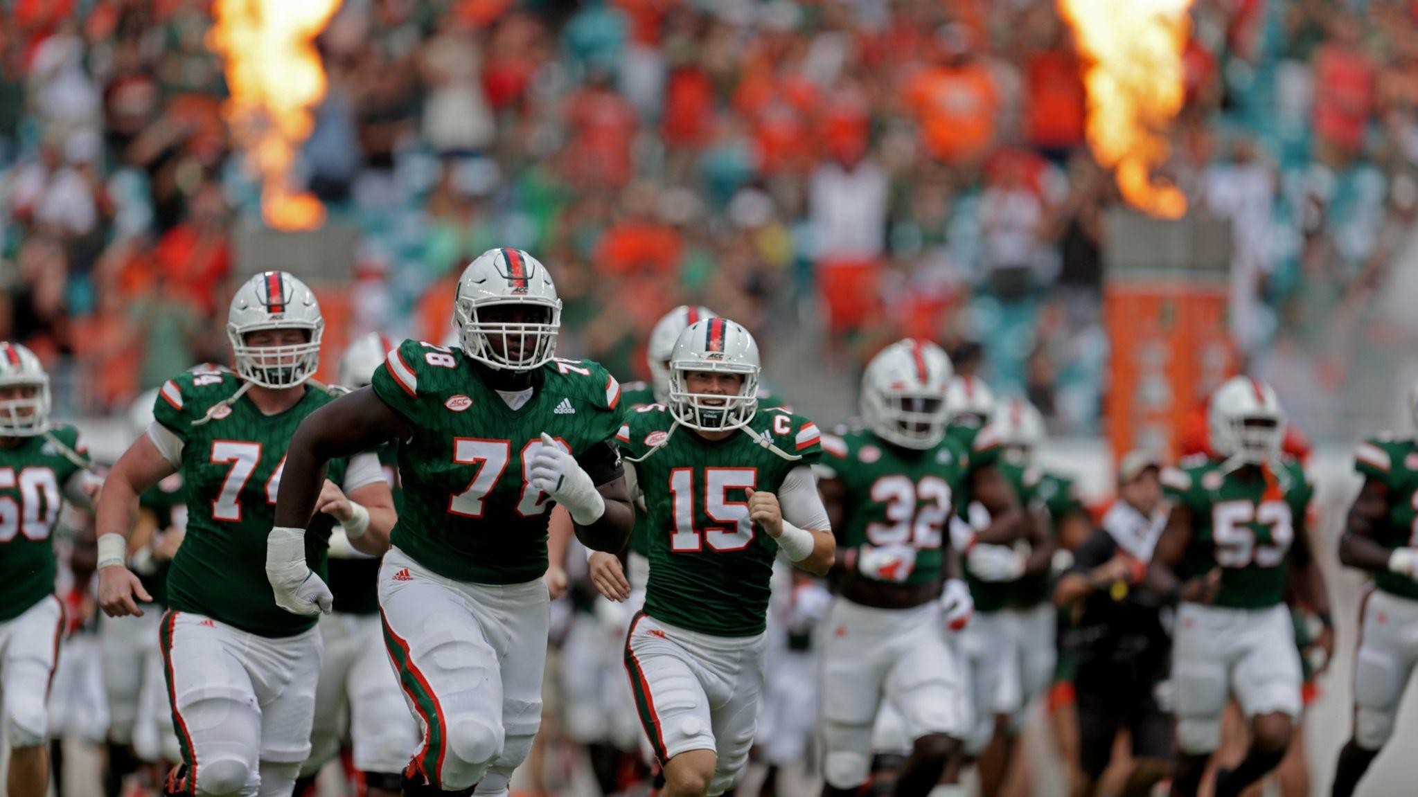 UM adds running backs coach Eric Hickson, offensive line coach Butch ...