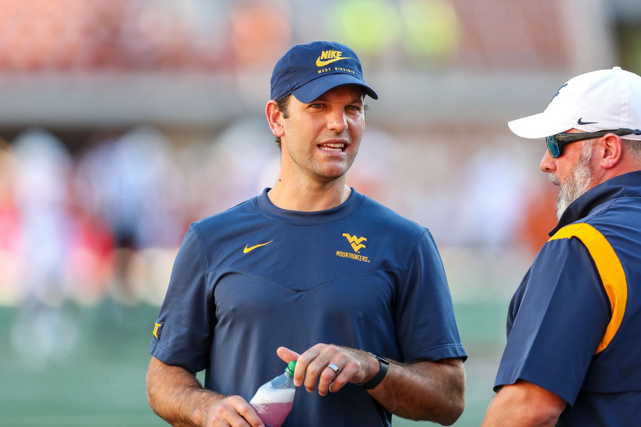 West Virginia offensive coordinator Graham Harrell leaving for same ...