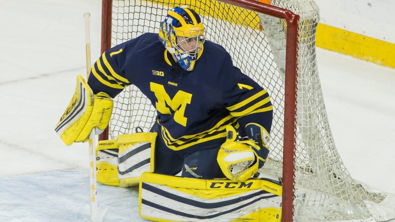 Racine Helps Wolverines Roll at Wisconsin