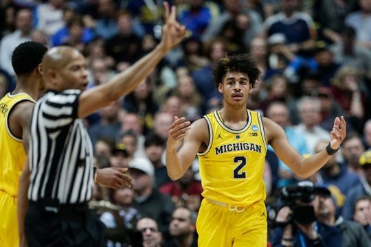 Michigan's Jordan Poole believes he's a pro, but will weigh options
