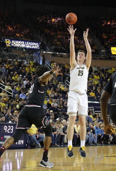 Jordan Poole's career day helps Michigan hold off South Carolina 89-78
