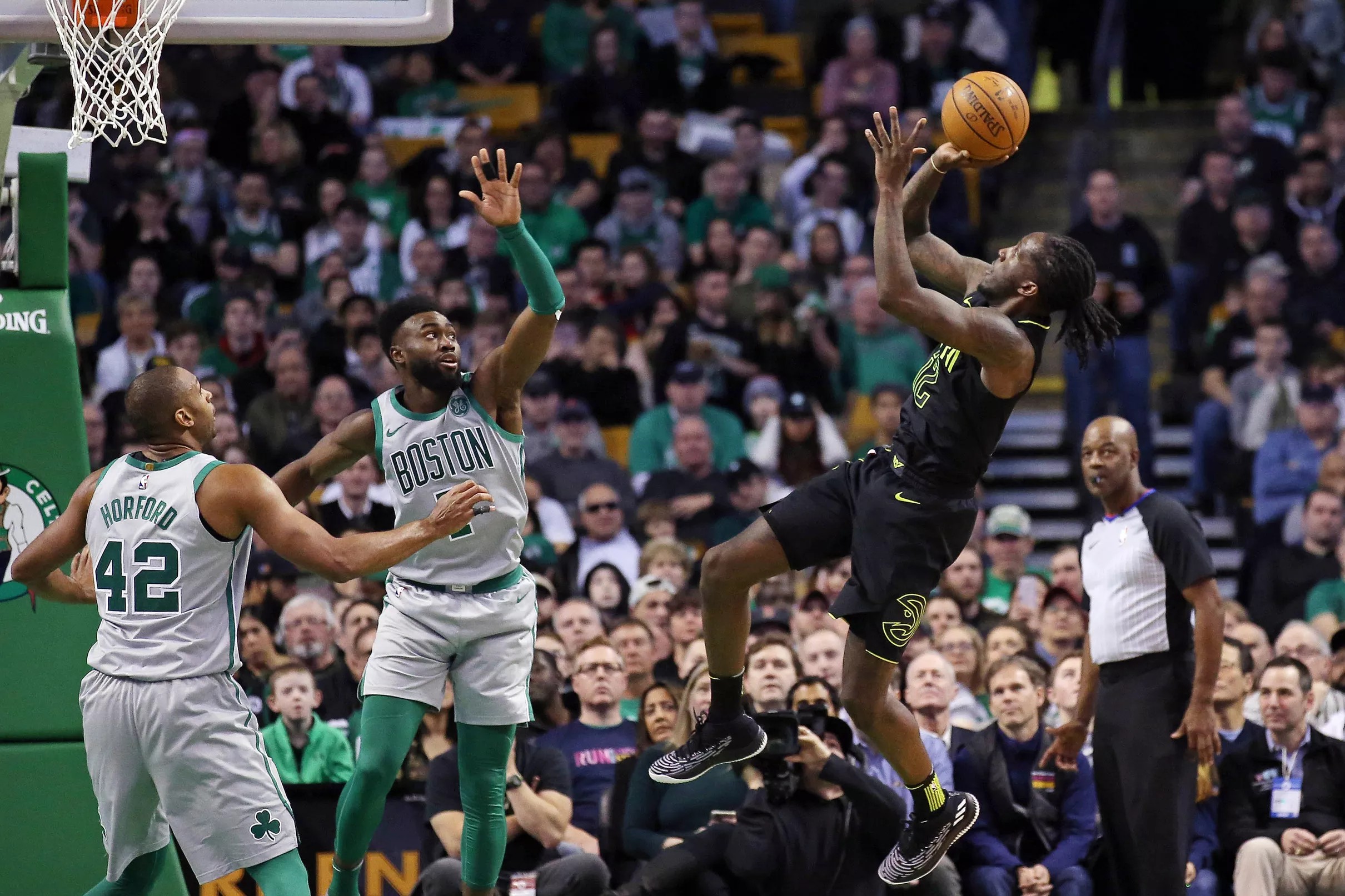 Hawks notch controversial win as Prince explodes for 33 points in Boston