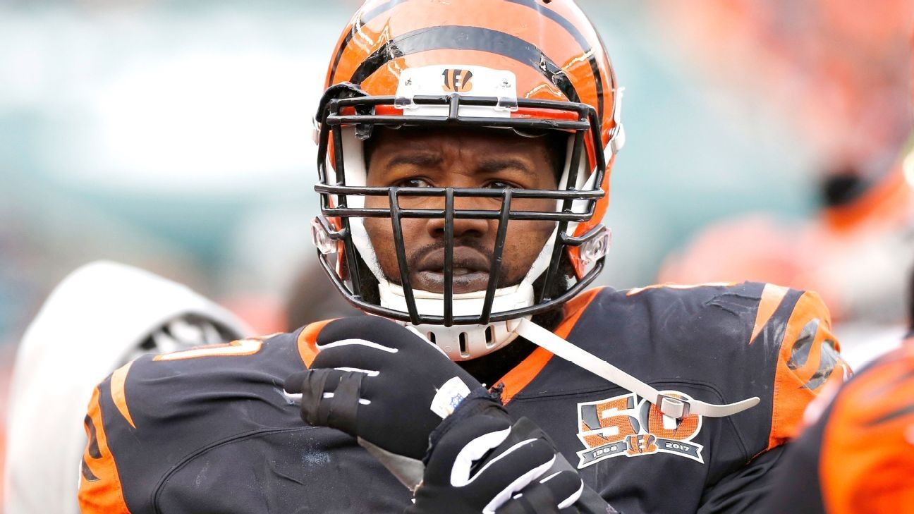 Bengals put OTJake Fisher on injury list, bring back Andre Smith