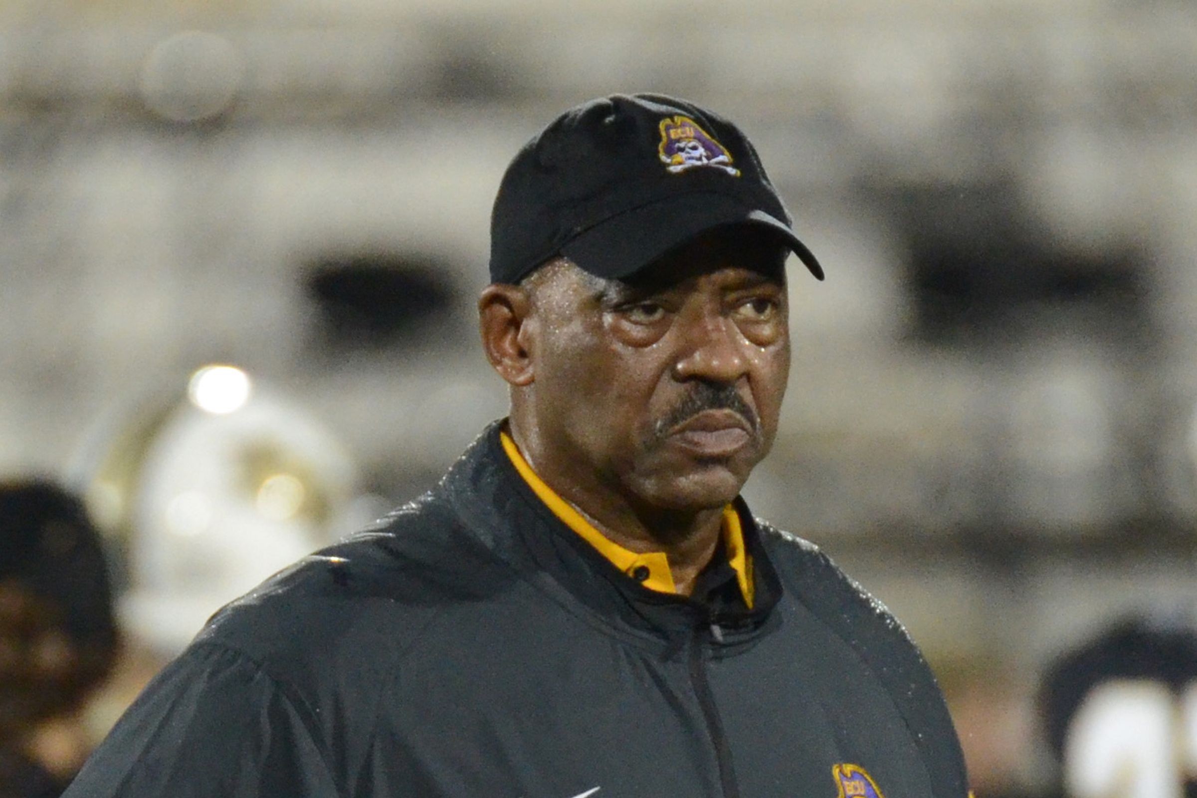 Virginia coaching staff: Ruffin McNeill, Nick Howell, and Kelly ...