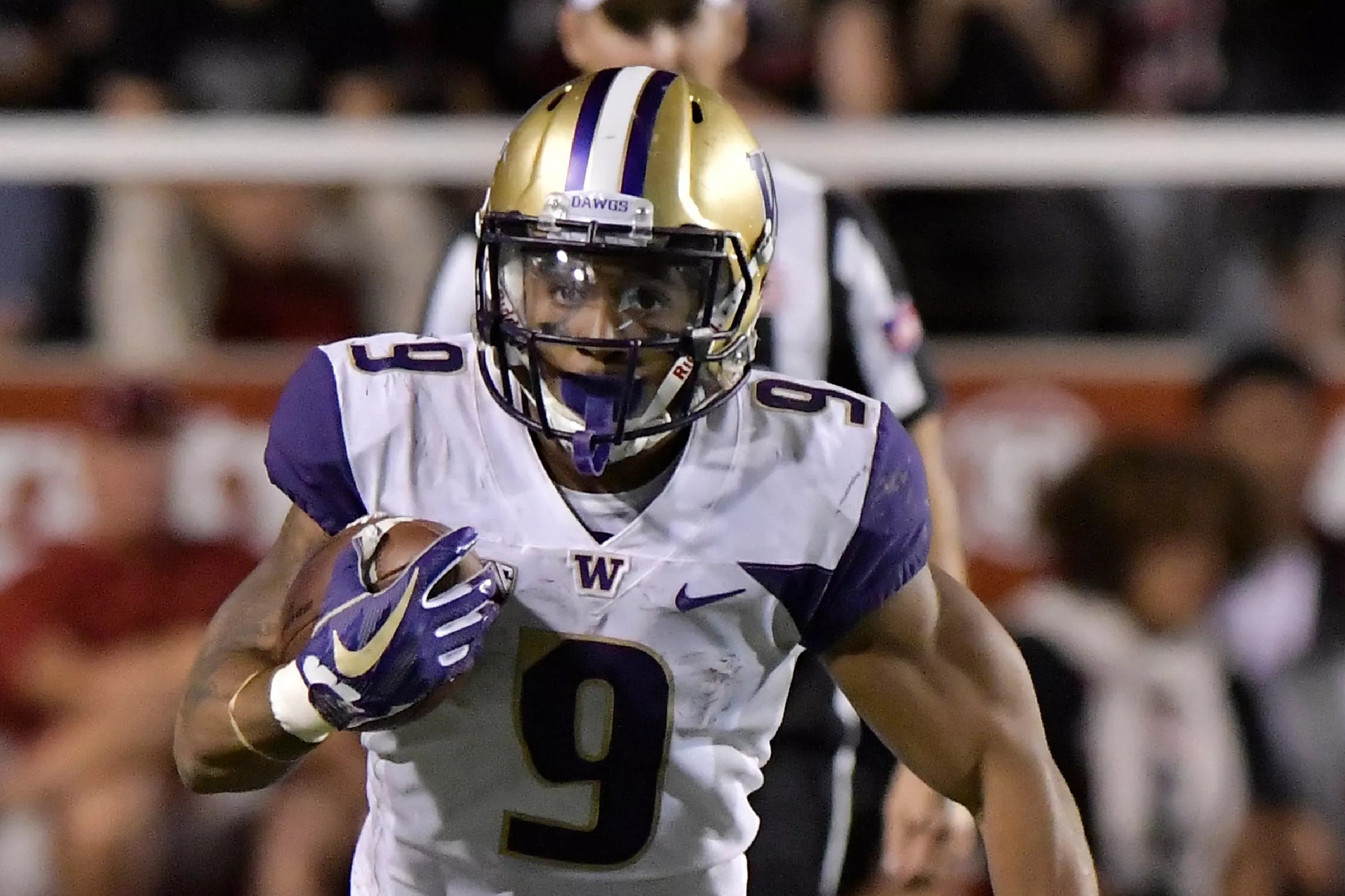 Myles Gaskin turned in a workhorse effort that secured Washington a two ...