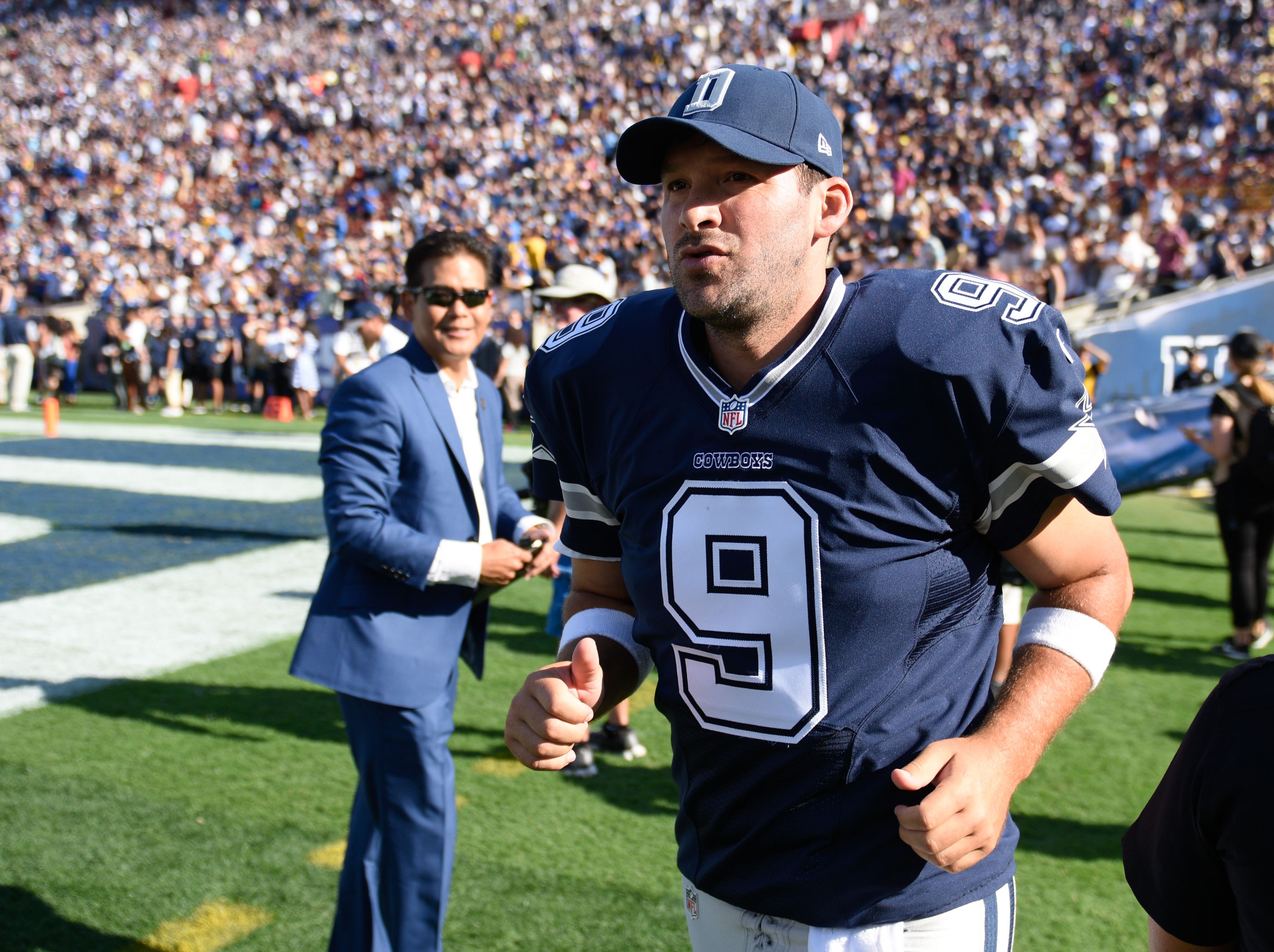 ESPN insiders predict Tony Romo will sign with the Houston Texans
