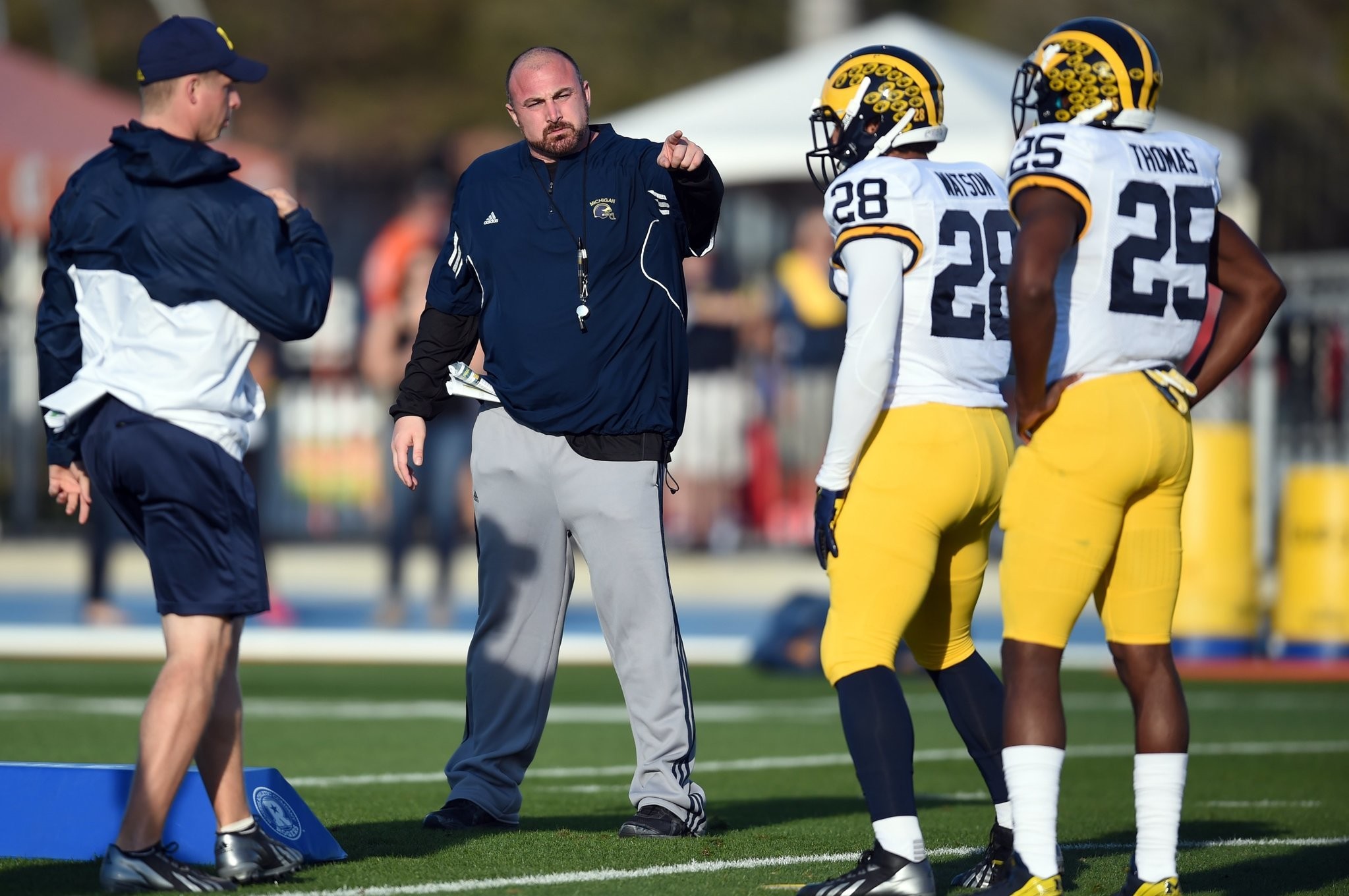 Michigan's Chris Partridge earns pay bump, new coaching duties