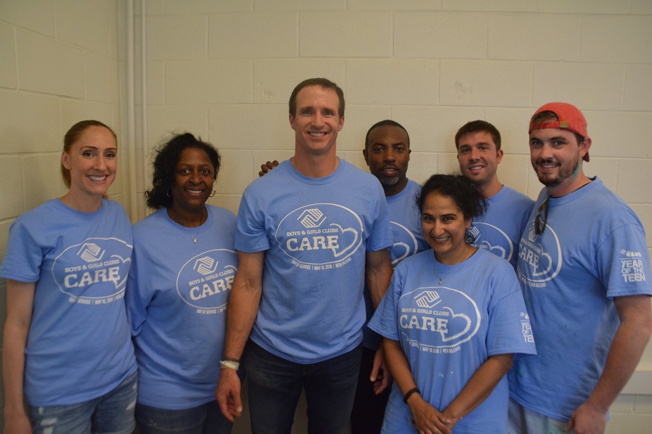 Drew Brees volunteers at NFL-YET Club in New Orleans for "Day of Service"
