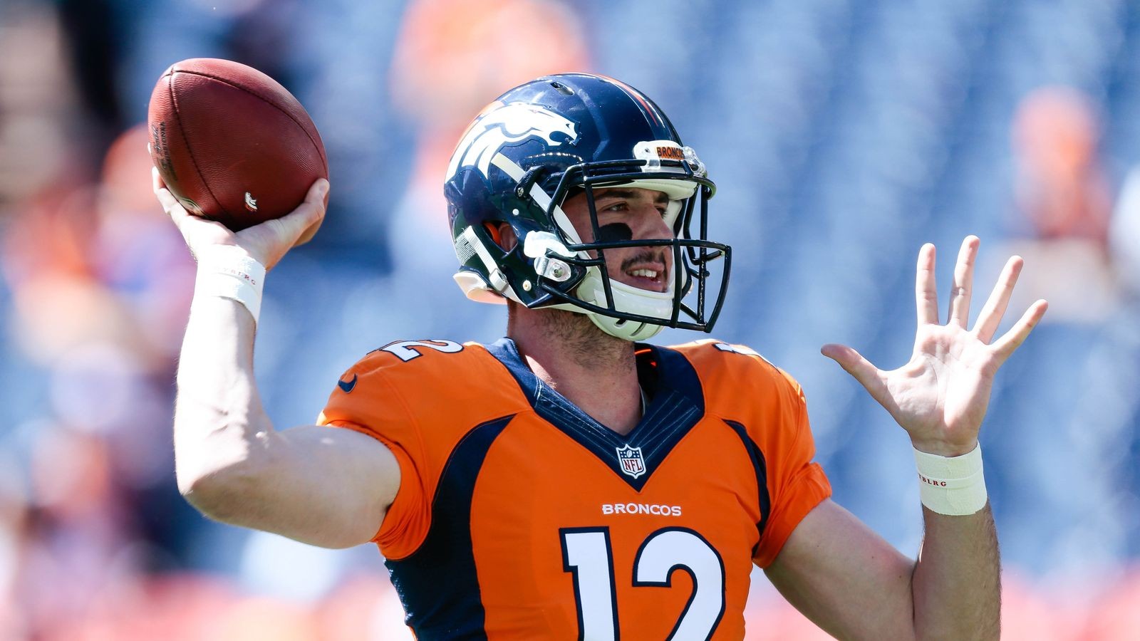 Which Denver Broncos quarterback is under more pressure this offseason?