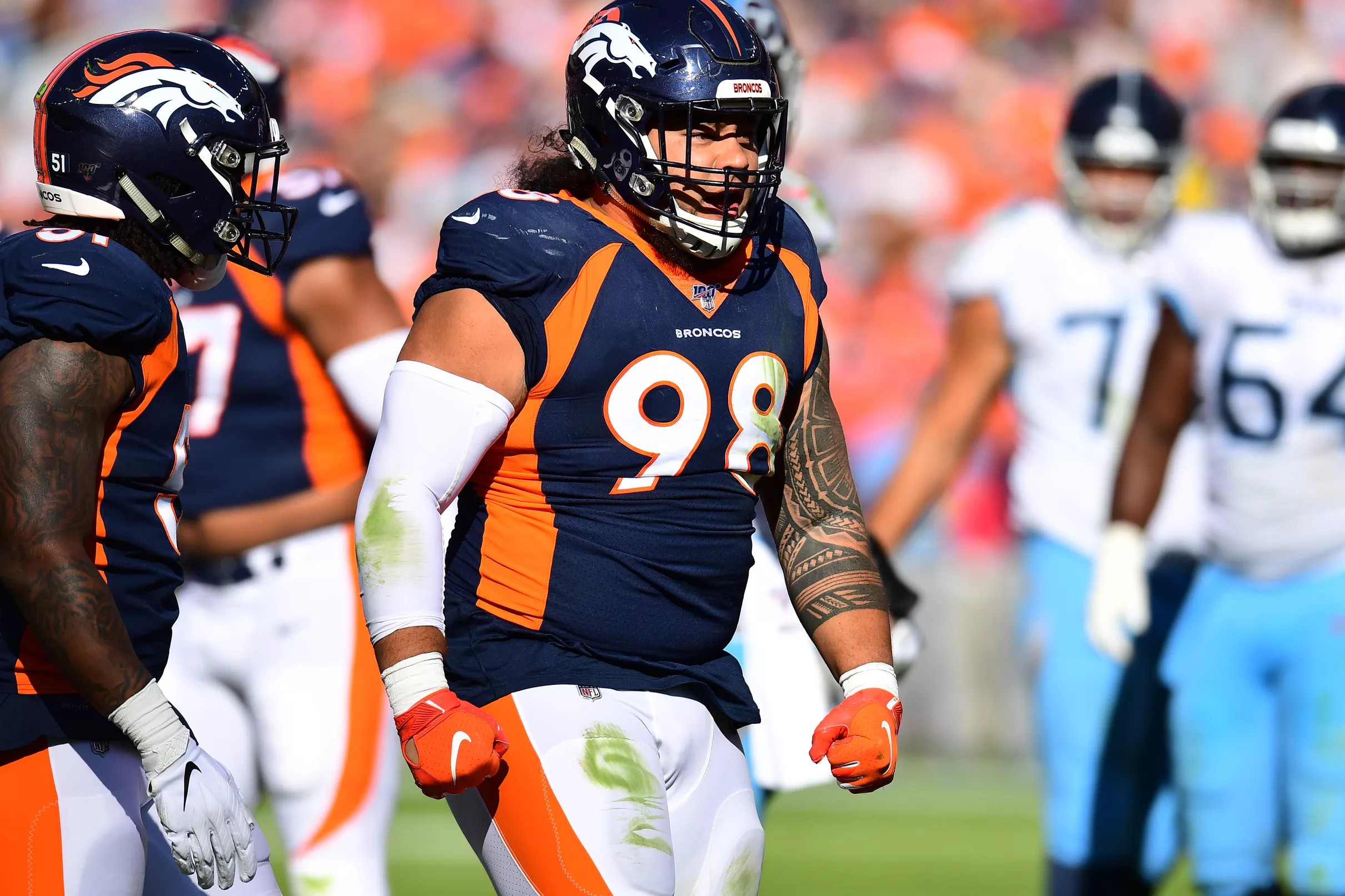 Broncos’ nose tackle Mike Purcell carted off the field with rib injury