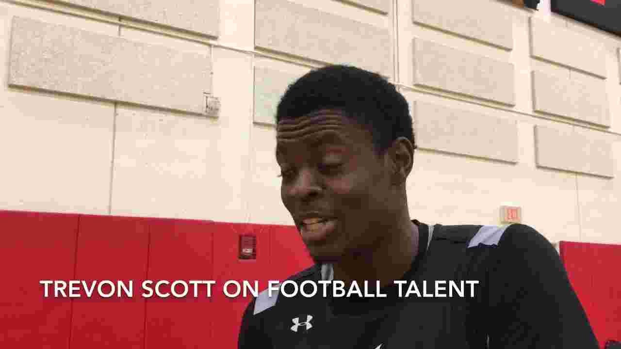WATCH UC hoopers Trevor Moore, Trevon Scott discuss football skills