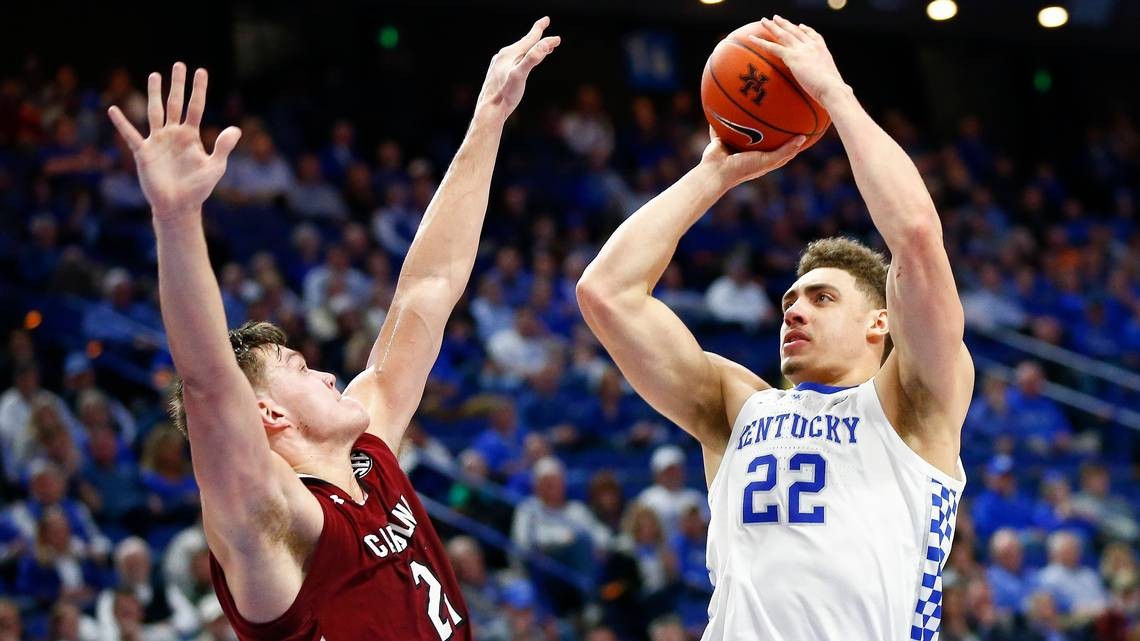 Travis ‘a beast,’ albeit an exhausted beast who needed an IV after UK’s win