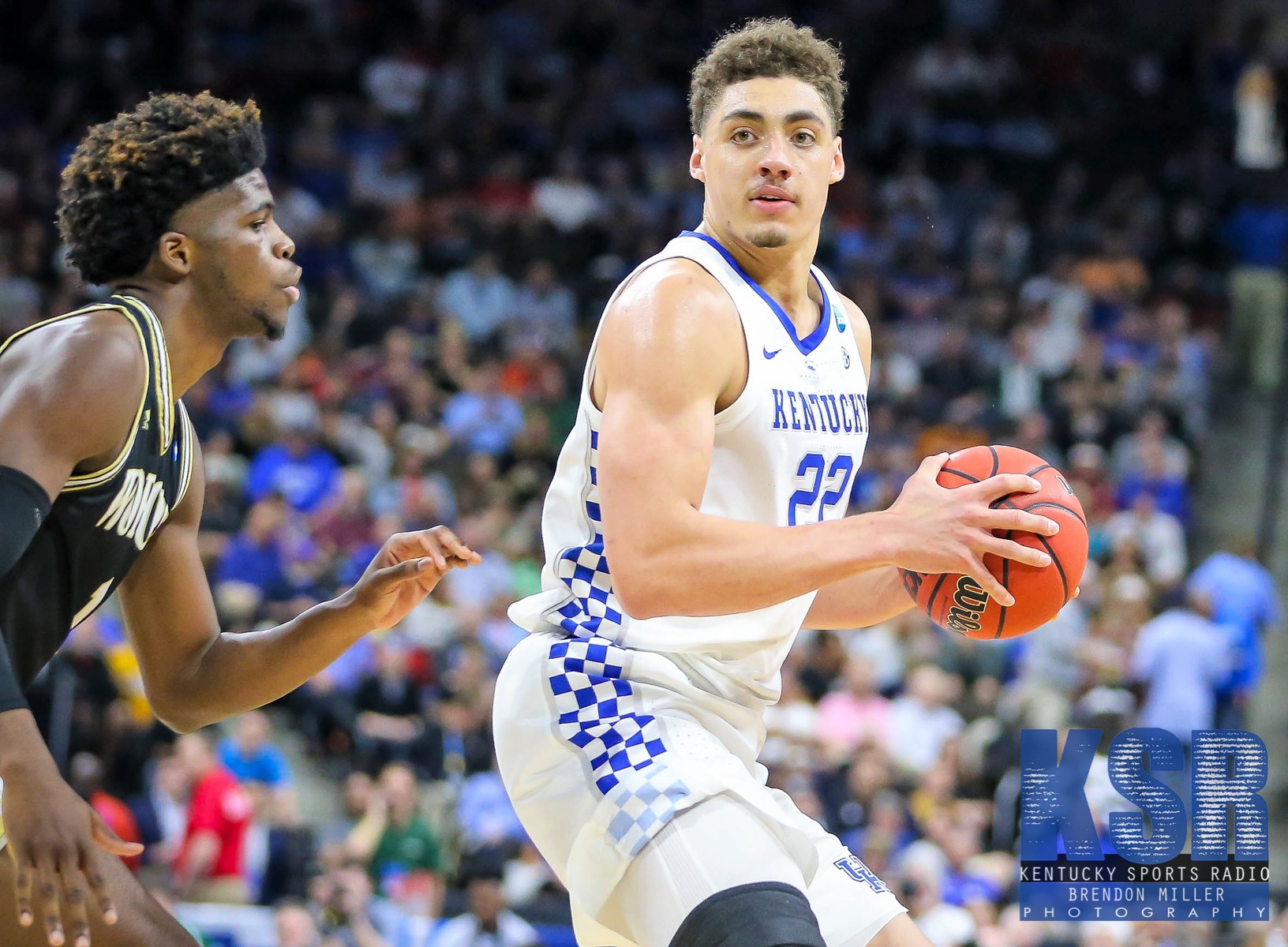 Reid Travis ditched the knee brace so he could finish the game