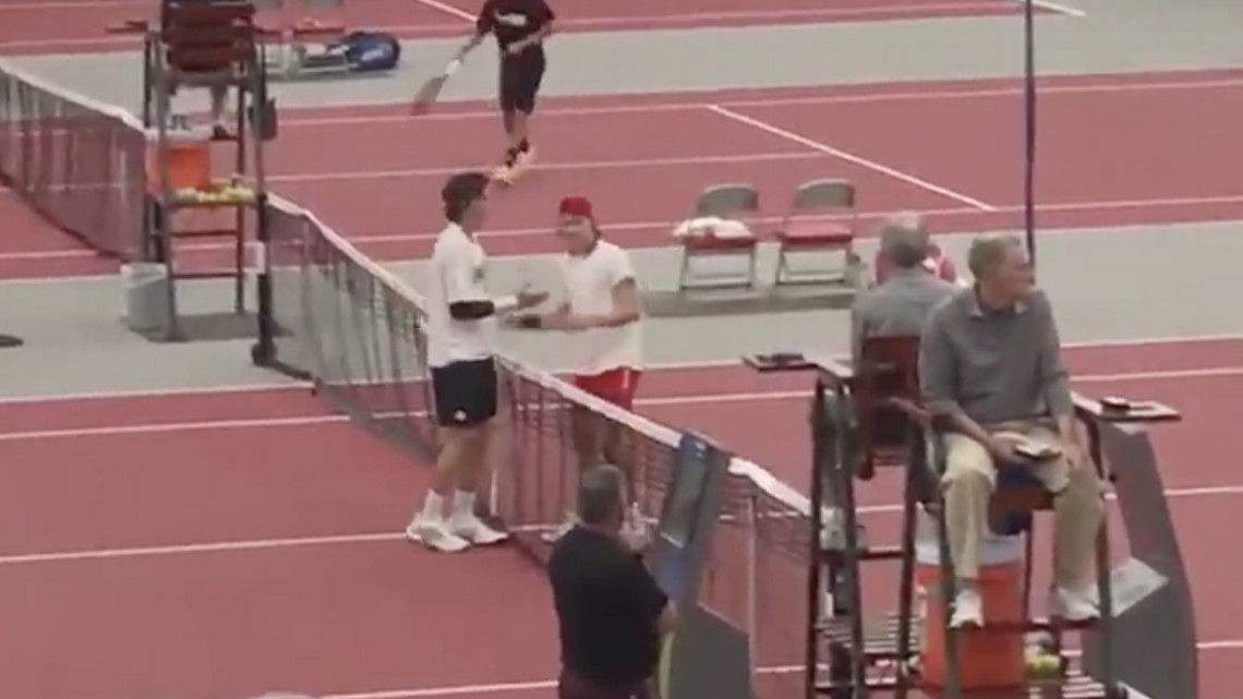 With a palm full of spit, an angry Aggie tennis player goes to shake ...