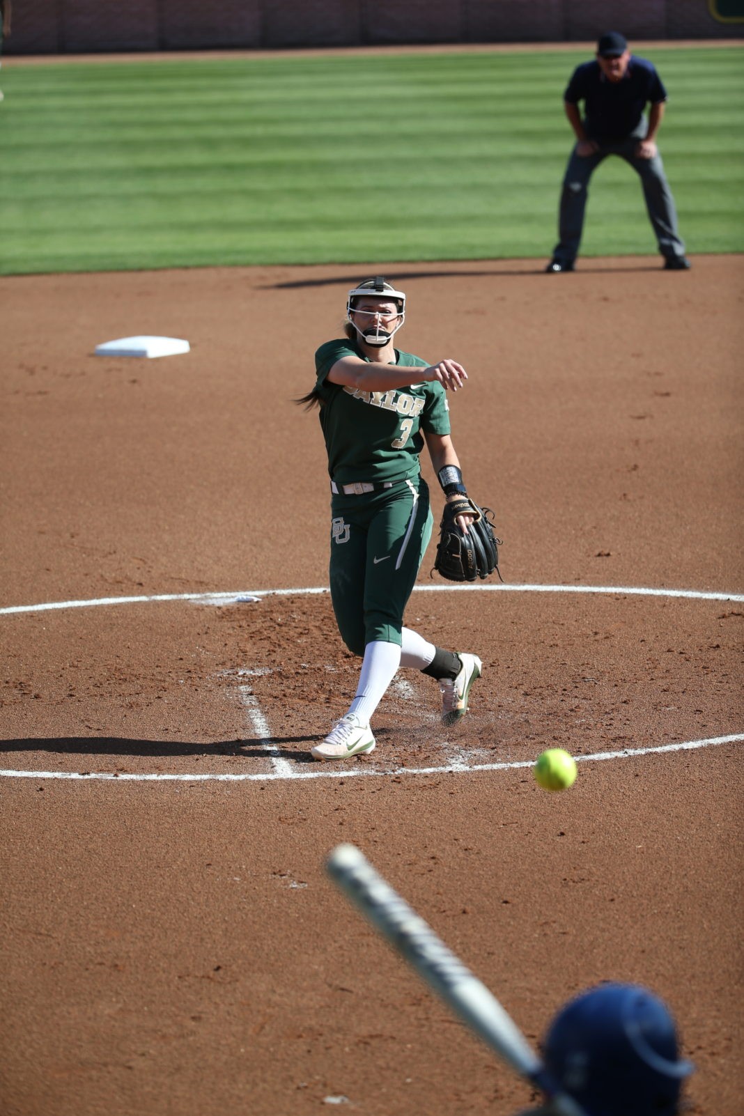 Softball splits pool play but advances to Big 12 Tournament ...