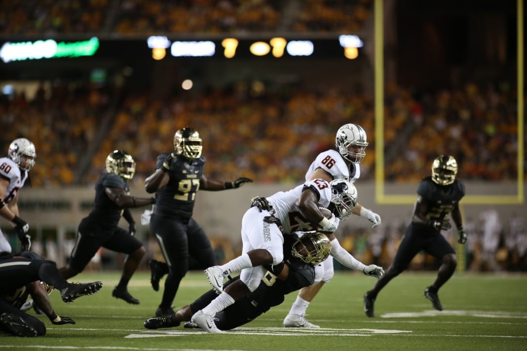 Cowboys run past Bears in first half, lead 35-10