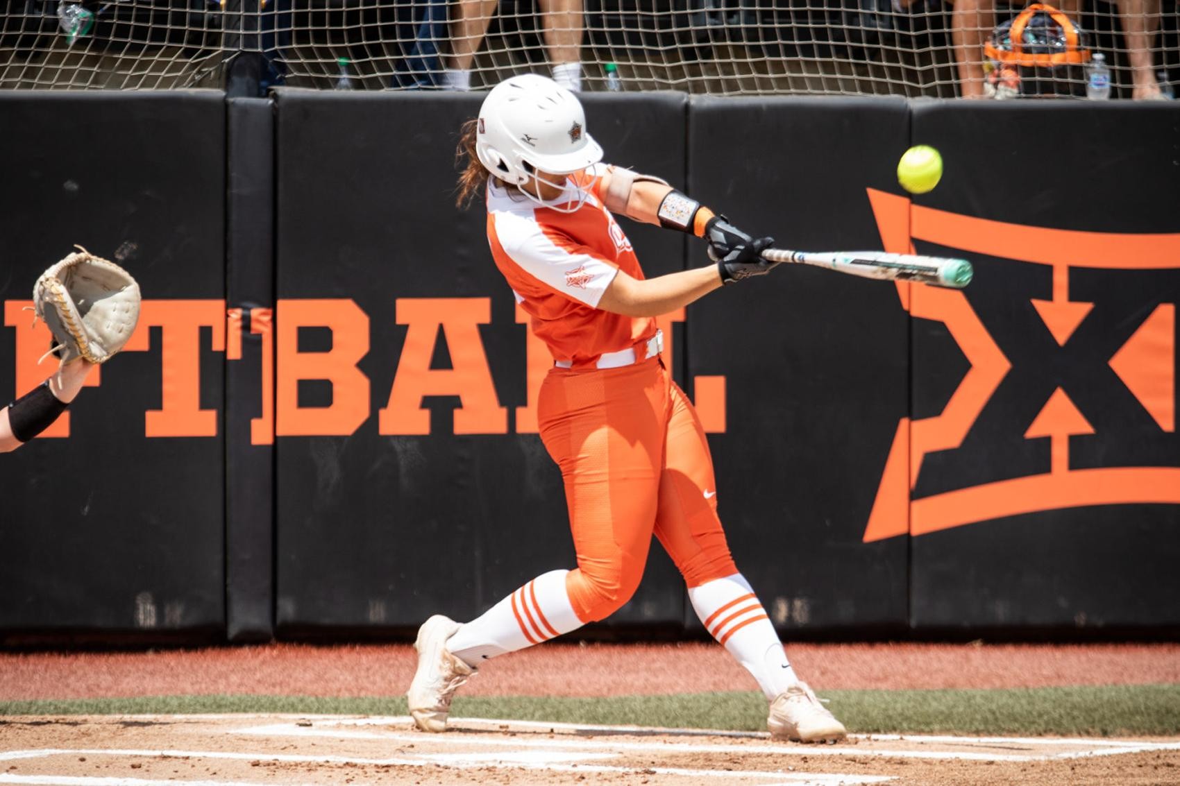 Cowgirls drop defending champions in first game of Super Regional