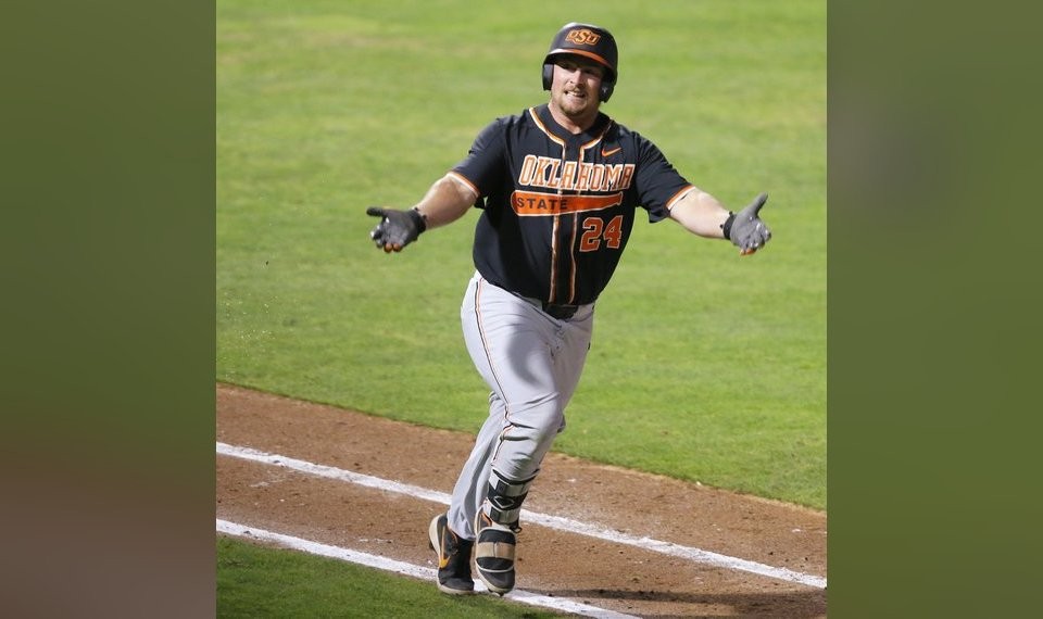 VIDEO: Former Cowboy Colin Simpson turning heads with bat, backflips in ...