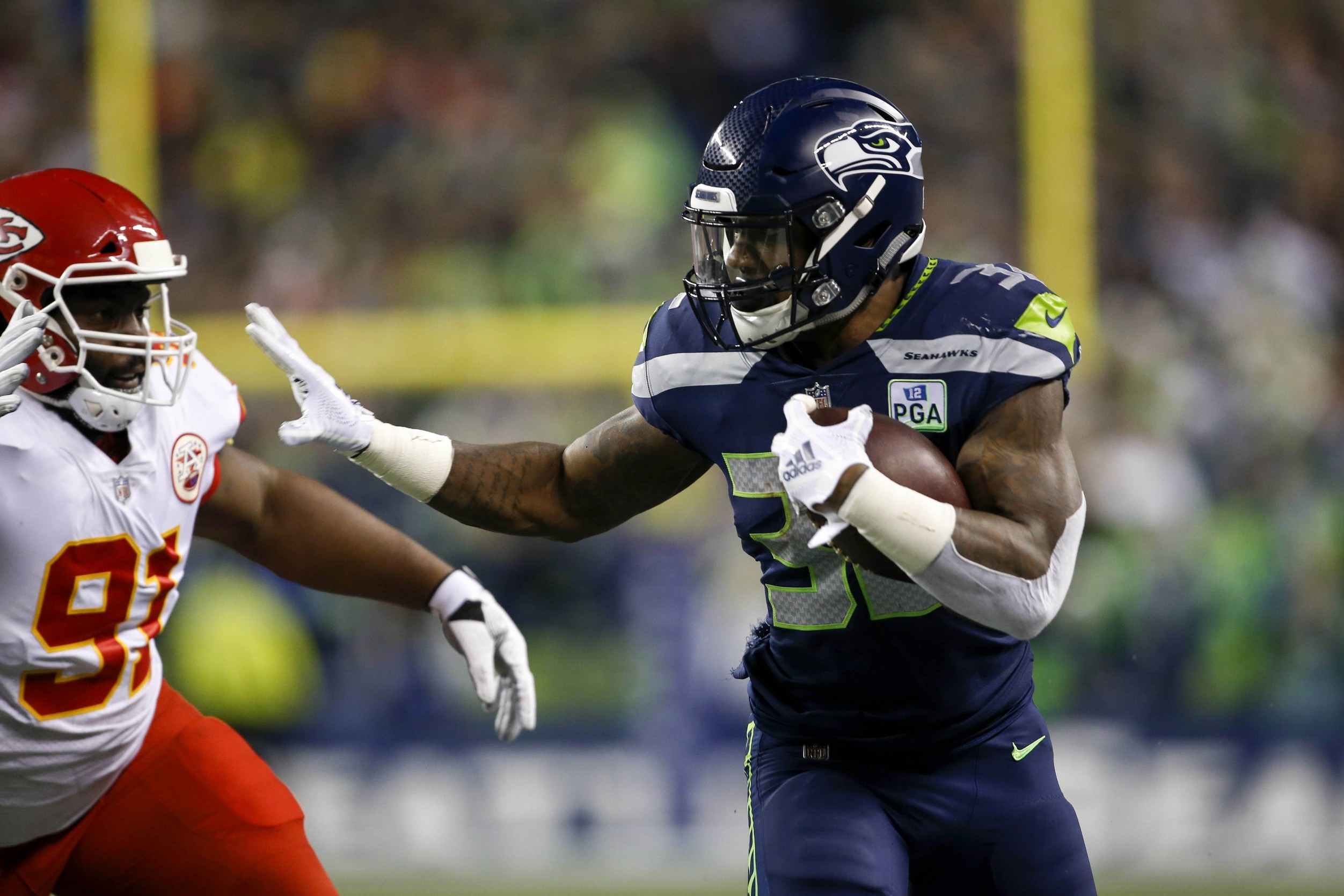 How a Challenge from a Former Teammate Spurred Chris Carson to Greatness