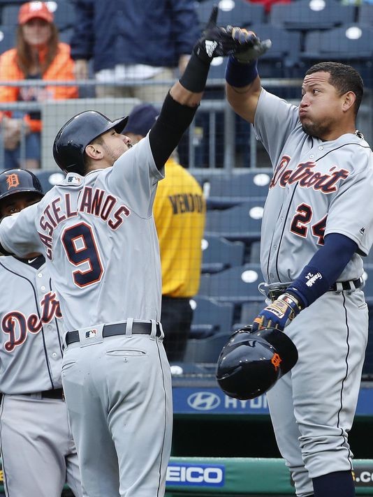 Tigers' bats rumble, arms flail in twinbill split